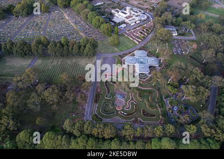 Aerial view of Woronora Cemetery and Sutherland suburb surrounded by ...