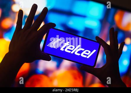 In this photo illustration, the Telcel logo is displayed on a ...