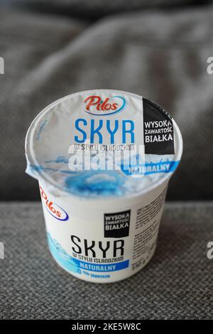 A selective focus of the Polish Pilos brand Iceland natural yogurt in a ...