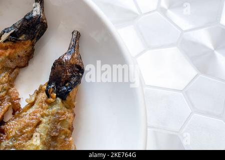 Tortang talong is an eggplant omelette Filipino dish and is a popuar ...