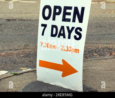 Open seven days a week, 24 hours a day. 24-7 green sign working around ...