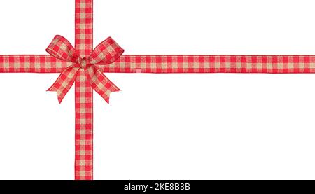 Beige gift box is tied with ribbon with bow on yellow background Stock ...