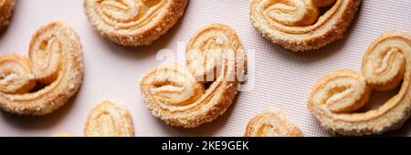 Tasty baked puff pastry pretzels Stock Photo - Alamy