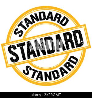 STANDARD text written on yellow-black trapeze stamp sign Stock Photo ...