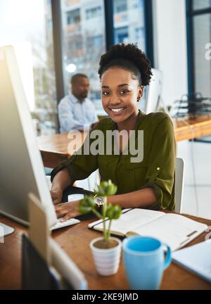 You can count on me. Portrait of a smiling young businesswoman in an ...