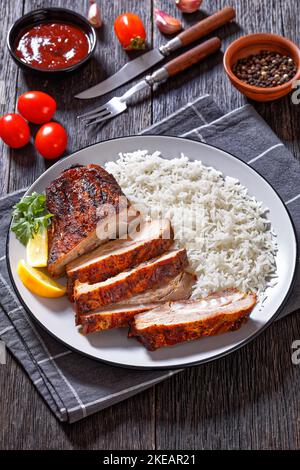 roast baby back pork meaty ribs with basmati rice Stock Photo - Alamy