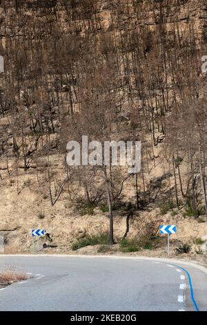 Road route that crosses area burned by recent fire, traffic signs warn ...