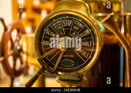 Full steam ahead, a brass ship's telegraph in the full ahead position ...