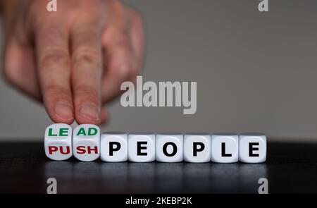 Push or lead people symbol. Concept words Do not push people lead them ...