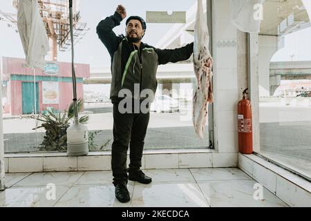 Saudi Arabia, Najran province, Najran, butcher shop, man, meat ...