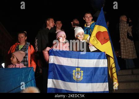 KYIV, UKRAINE - NOVEMBER 11, 2022 - People with flags celebrate the ...