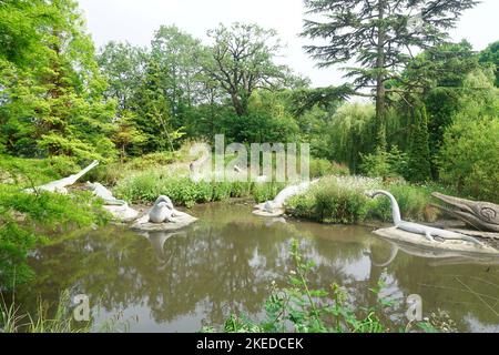 Sculptures of dinosaurs and other extinct animals near the river Effra ...