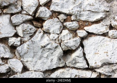 a wall made of stones – a surface texture Stock Photo - Alamy