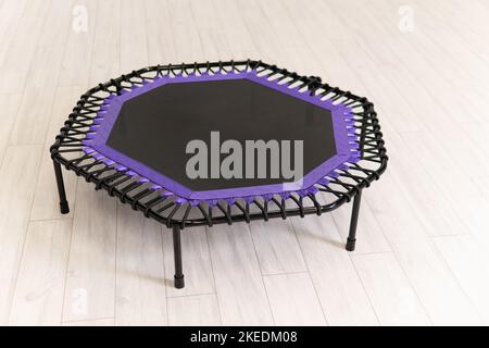 leisure fitness little trampoline jump empty space small purple white ...