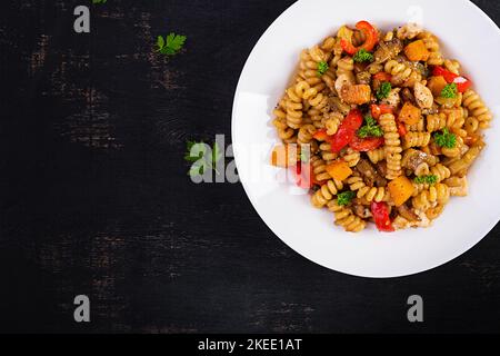 Vegetable pasta fusilli corti bucati with eggplant, sweet pepper and ...