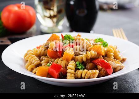 Vegetable pasta fusilli corti bucati with eggplant, sweet pepper and ...