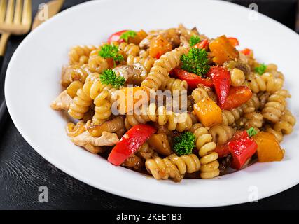 Vegetable pasta fusilli corti bucati with eggplant, sweet pepper and ...