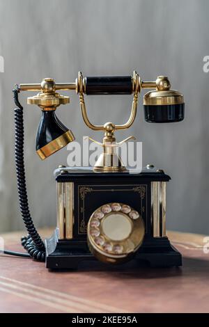 Old antique vintage traditional black phone with disc dials the 19th ...