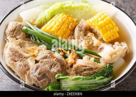 Bulalo is a Filipino boiled soup made with bone-in beef shanks, corn ...