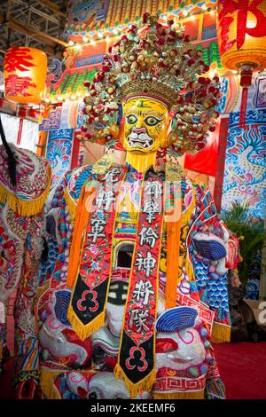 Elaborate, colourful life-size puppet of a demon, used in processions ...