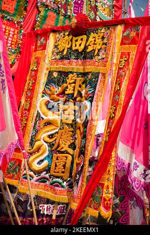 A richly embroidered processional banner featuring a dragon motif at ...