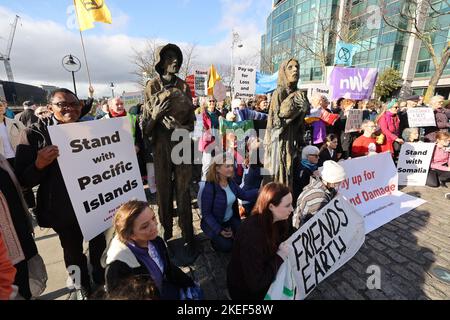 Campaigners hold a protest at the Irish Famine Memorial statues in the ...