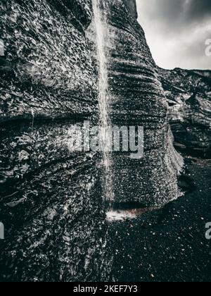 A minimalistic grayscale of the rock formations at the Katla volcano ...