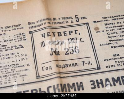 An old soviet newspaper Trud (Labor) in a woman hands. The newspaper ...