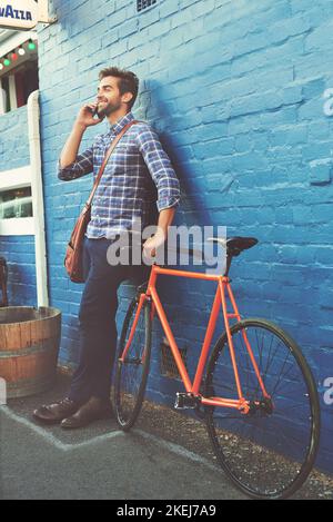 Handsome man posing with bicycle against white background Stock Photo ...