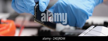 Technician connects a CPU microprocessor to motherboard socket Stock Photo - Alamy