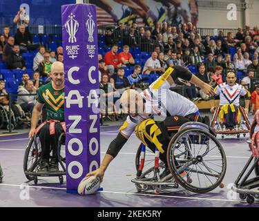 Jeremy Bourson of France goes over for a try during the Wheelchair ...