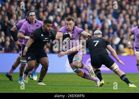 Scotland's Jack Dempsey is tackled during the Guinness Six Nations ...