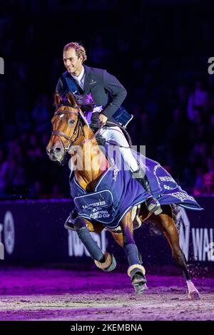 Richard Vogel of Germany rides United Touch S during the FEI Jumping ...