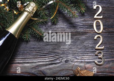 wooden number 2023 on christmas shiny wooden background. with sparkle ...