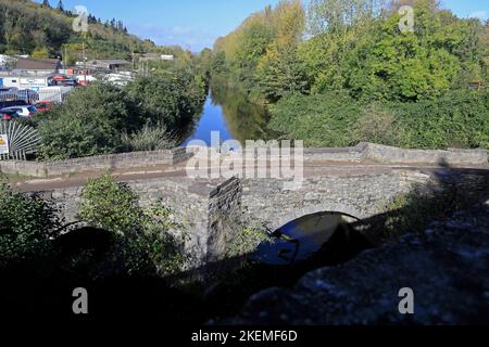 The old stone triple-arched Leckwith Bridge crosses the River Ely ...