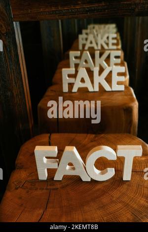 Fact or Fake symbol. Concept word Fact or Fake on wooden blocks ...