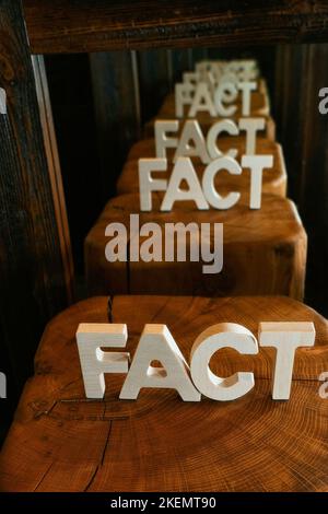 A vertical shot of an infinite reflection of the word "Fake Stock Photo ...
