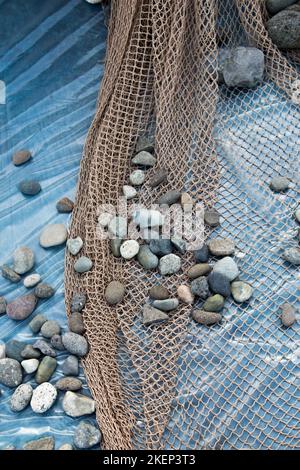 Background consist of full of little pebbles Stock Photo - Alamy