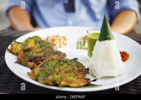 Delicious Balinese rice with vegetables Stock Photo - Alamy