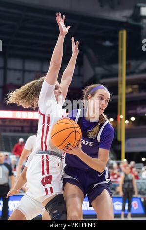 Kansas State guard Serena Sundell (4) passes in front of Iowa guard ...