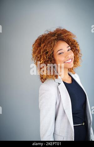Confidence is the key to success. Studio portrait of an attractive ...