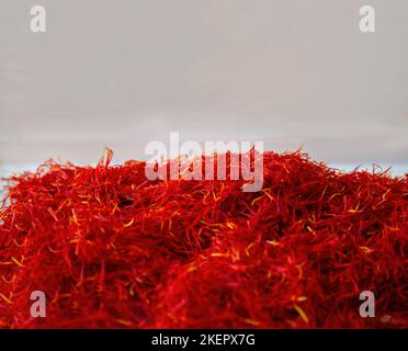 Saffron separation process, Crocus threads on black separator. Flower ...