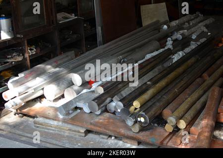 Workshop store metal rods small Bangkok Thailand Stock Photo - Alamy