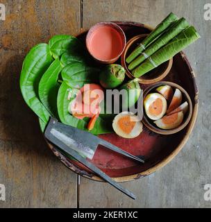 Betel nut, red lime and betel Stock Photo - Alamy