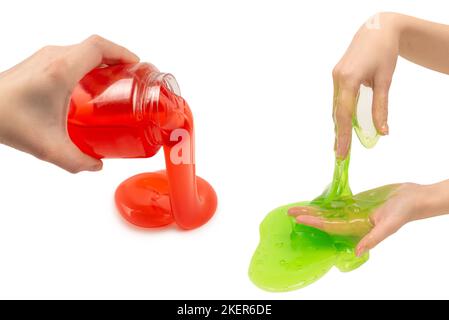 Green slime toy in woman hand with green nails isolated on a white ...