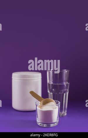 hydrolyzed collagen powder in bowl and spoon - Organic gelatin powder ...