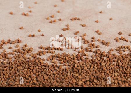 Grains of raw buckwheat as a background texture Stock Photo - Alamy