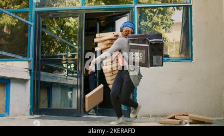 Sad customer crying after dropped pizza boxes, clumsy courier dropping ...