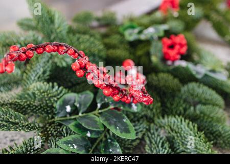 Macro photo of steaming cast iron hot tub with spa in winter with snow ...