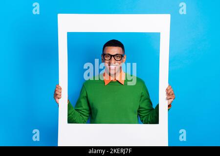 Portrait photo cadre of young man student wear green sweater inside ...
